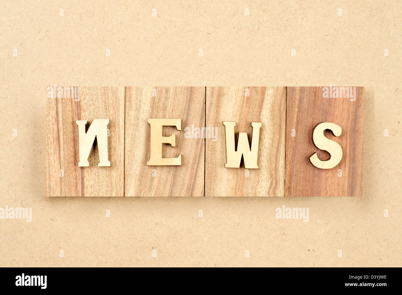 News word in cutting wooden Stock Photo - Alamy