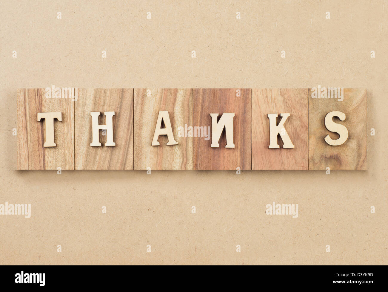 Thanks word in cutting wooden Stock Photo - Alamy