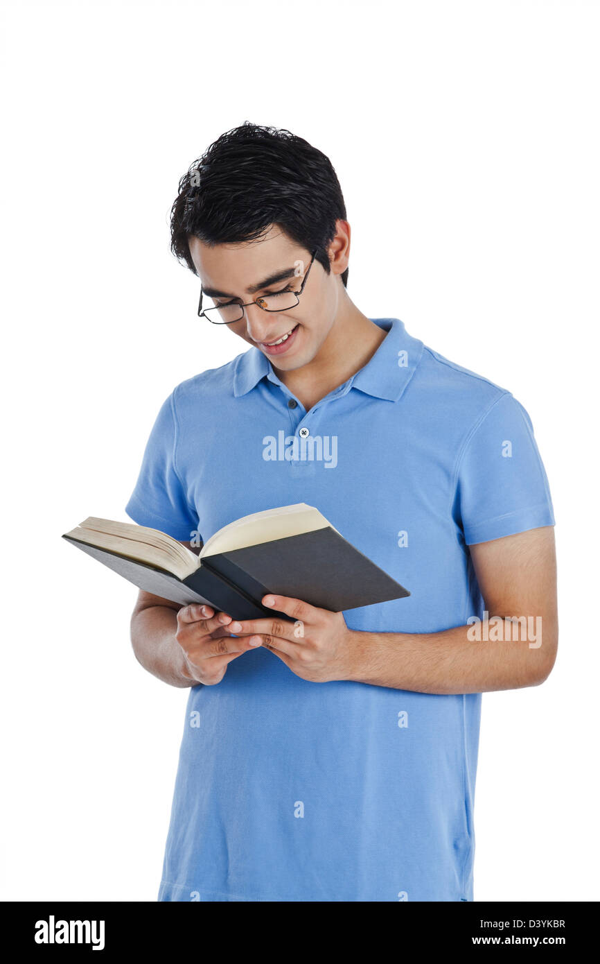 Happy man reading a book Stock Photo - Alamy