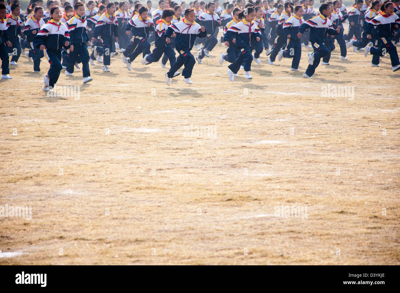 Asian kids on the run Stock Photo - Alamy