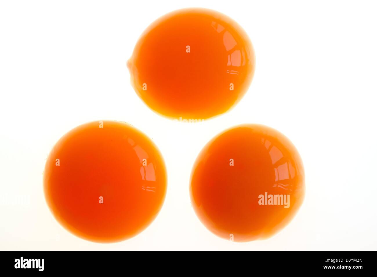 The illustration shows three egg yolks on a light table in Hanover ...