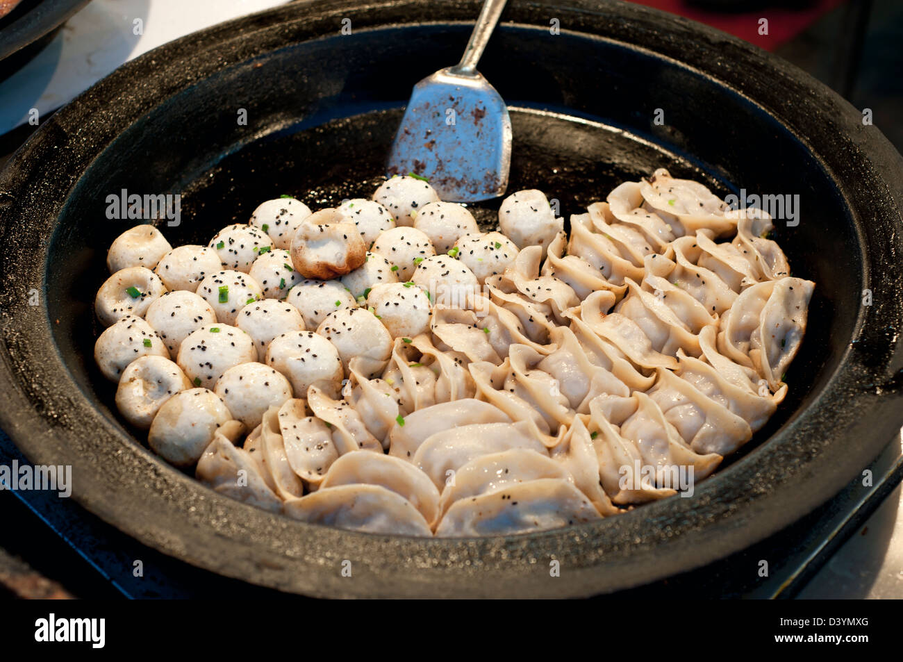 Shanghai-style pan-fried meat buns, Shanghai, China Stock Photo - Alamy