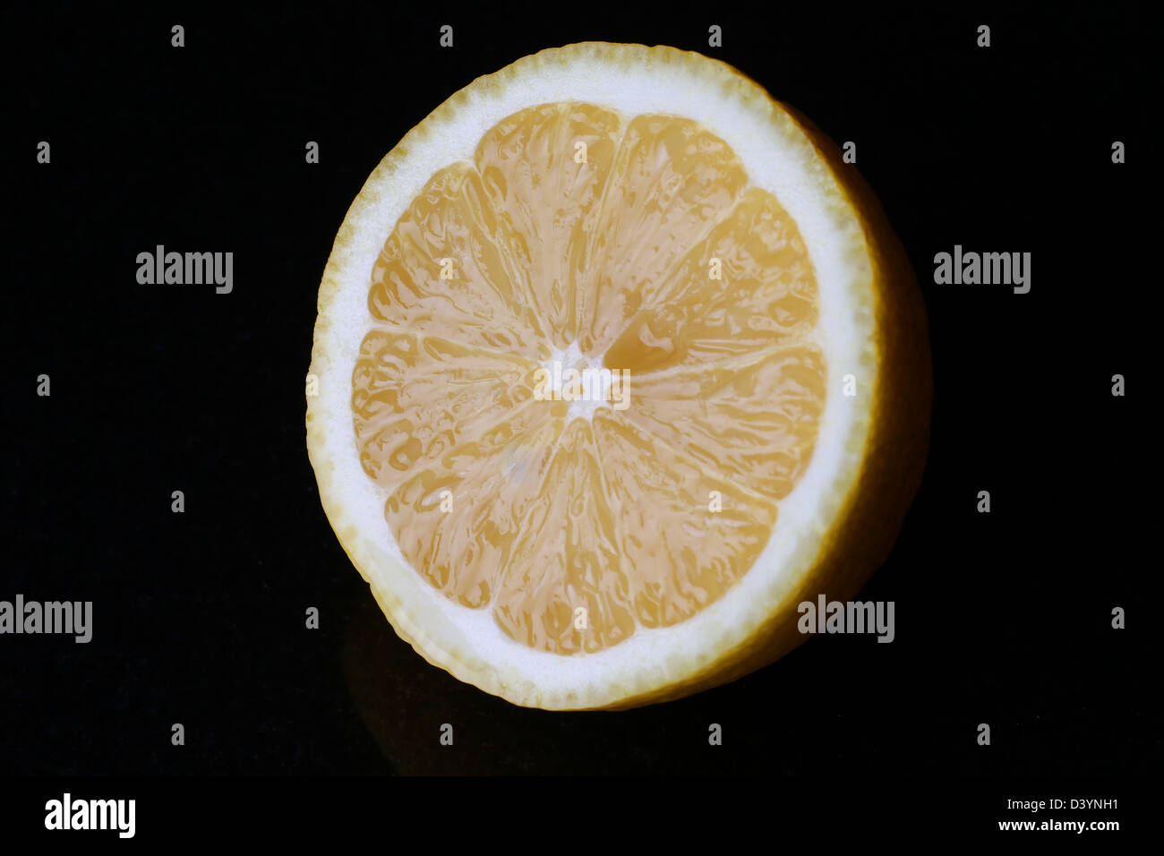 Fresh Lemons cut in half Stock Photo - Alamy