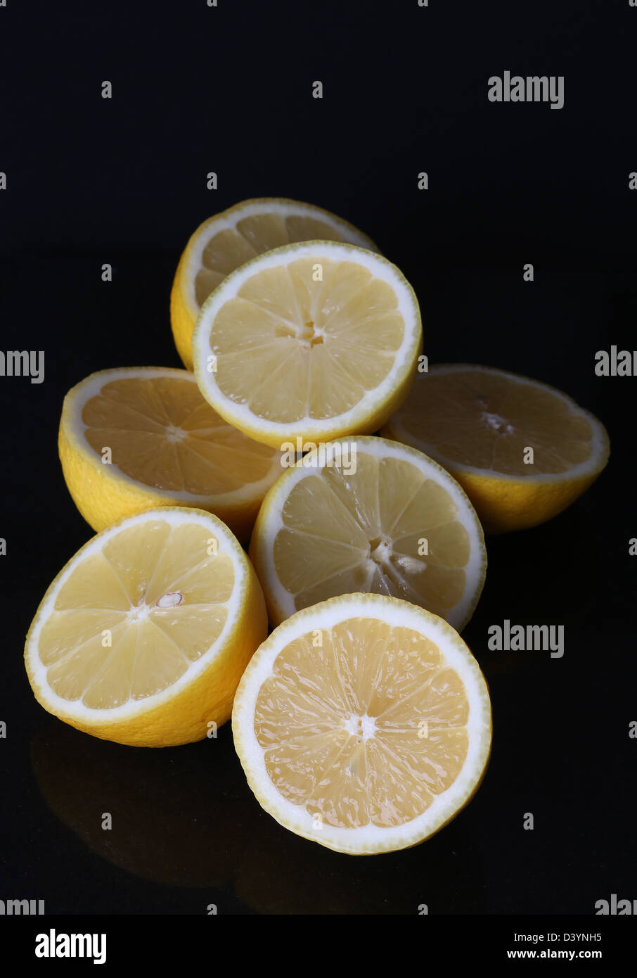 Fresh Lemons cut in half Stock Photo - Alamy