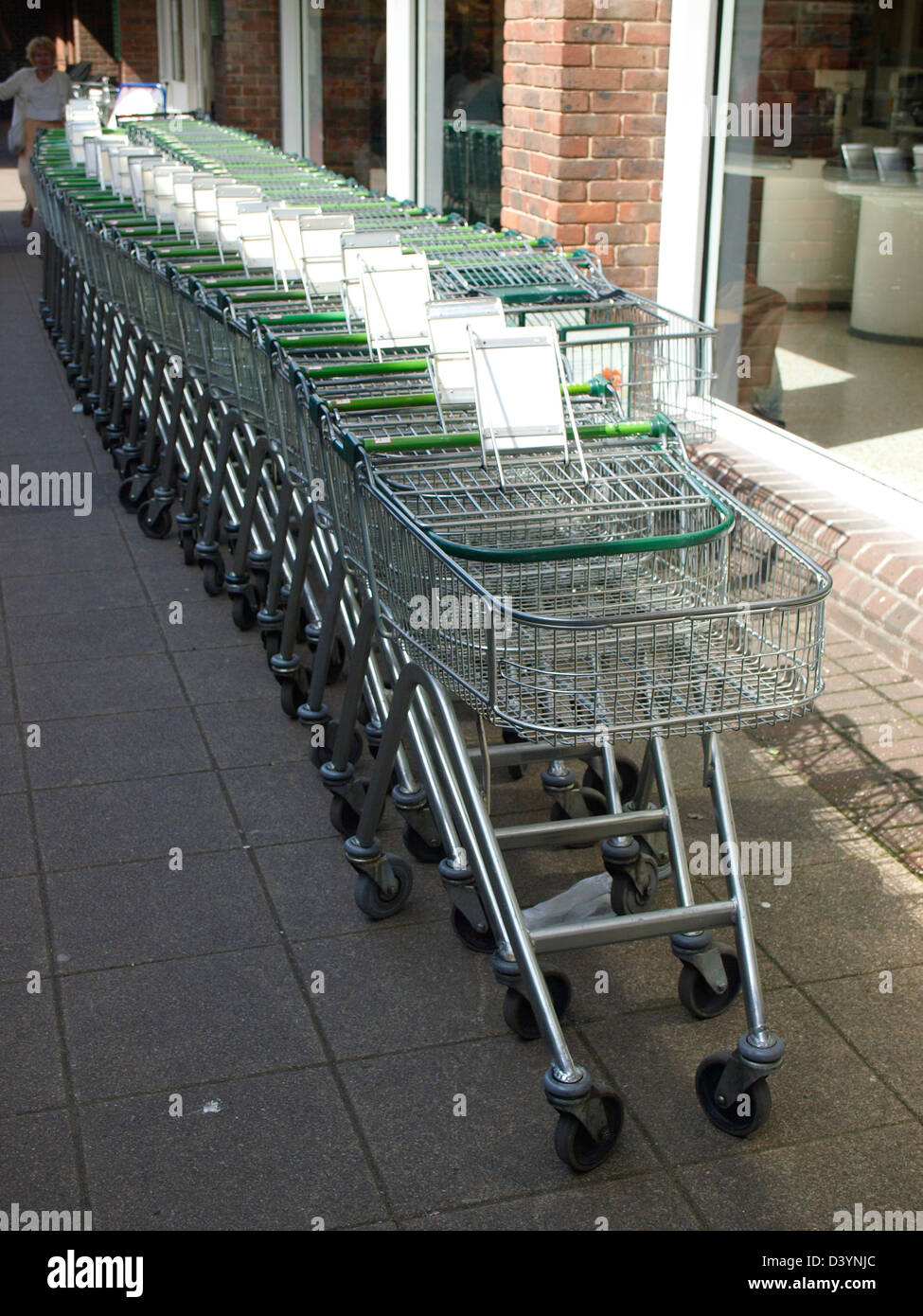 row of shopping trolleys Stock Photo - Alamy