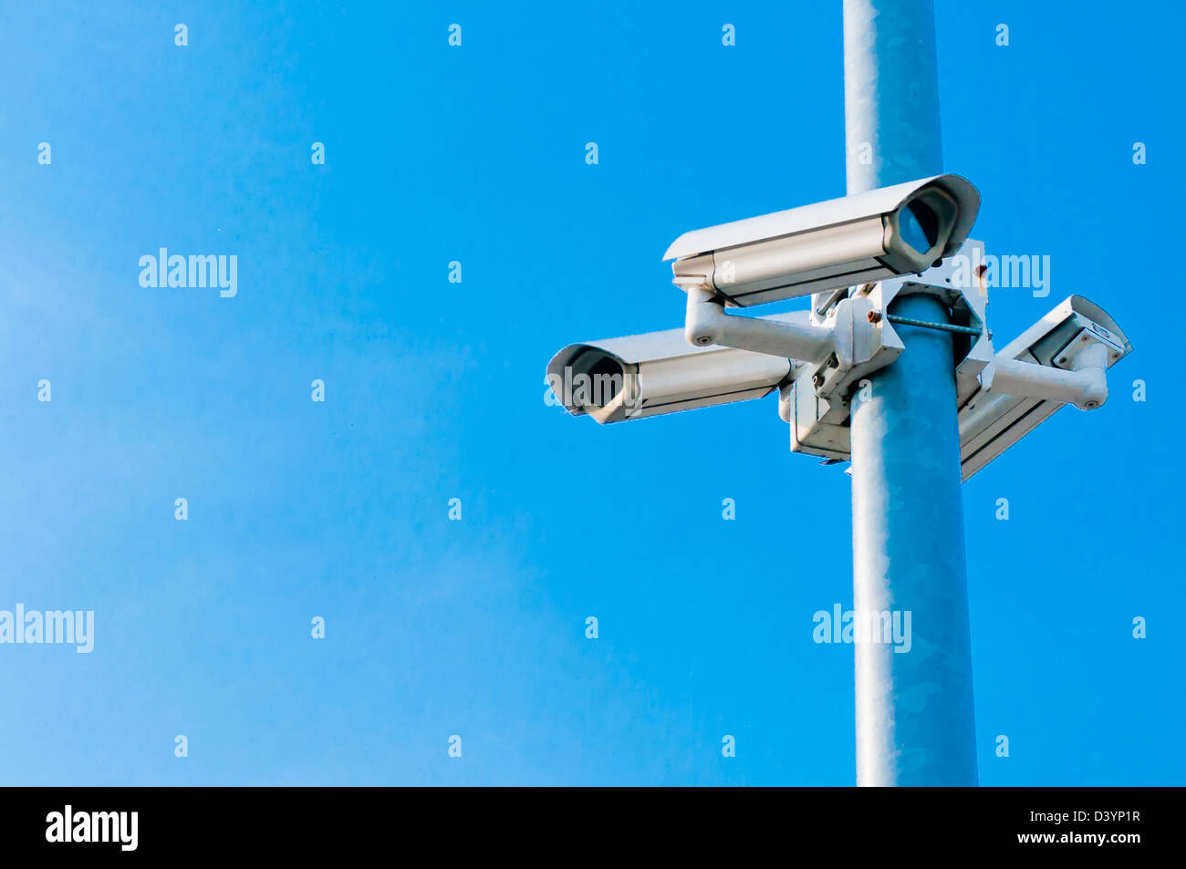 security cctv cameras on a pole with blue sky background Stock Photo ...