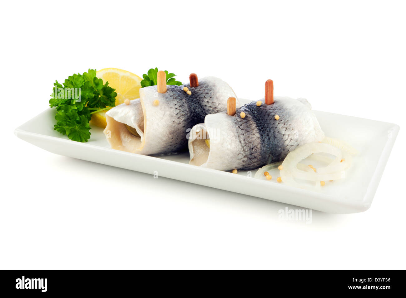 German Rollmops - kipper wrapped around pickled cucumber - on a square ...