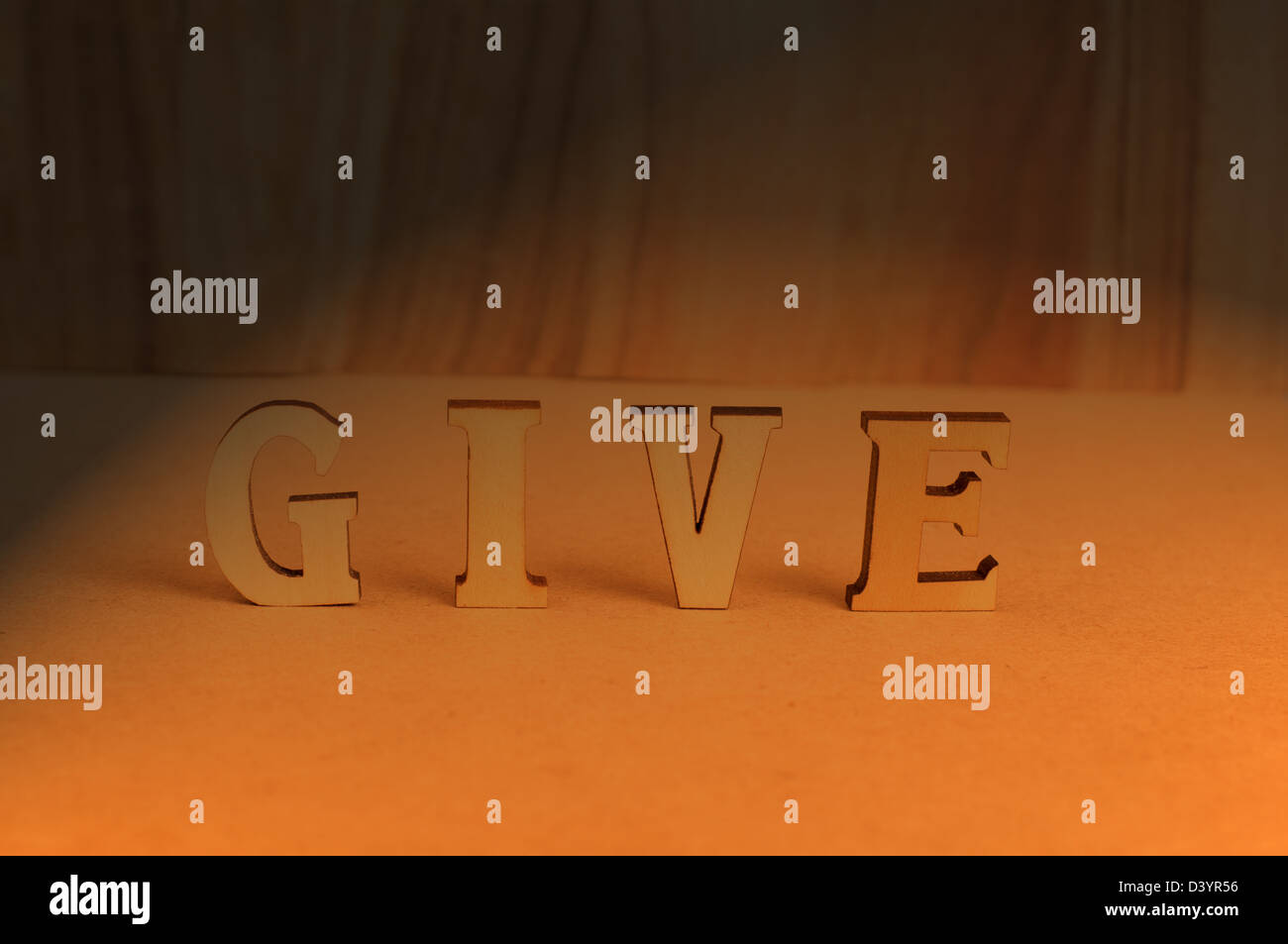 The give word in a low-key lighting environment Stock Photo - Alamy