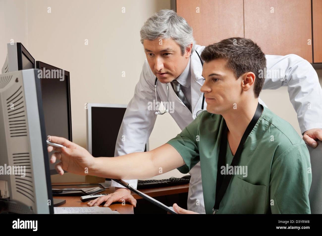 Doctor And Technician Working Together Stock Photo - Alamy