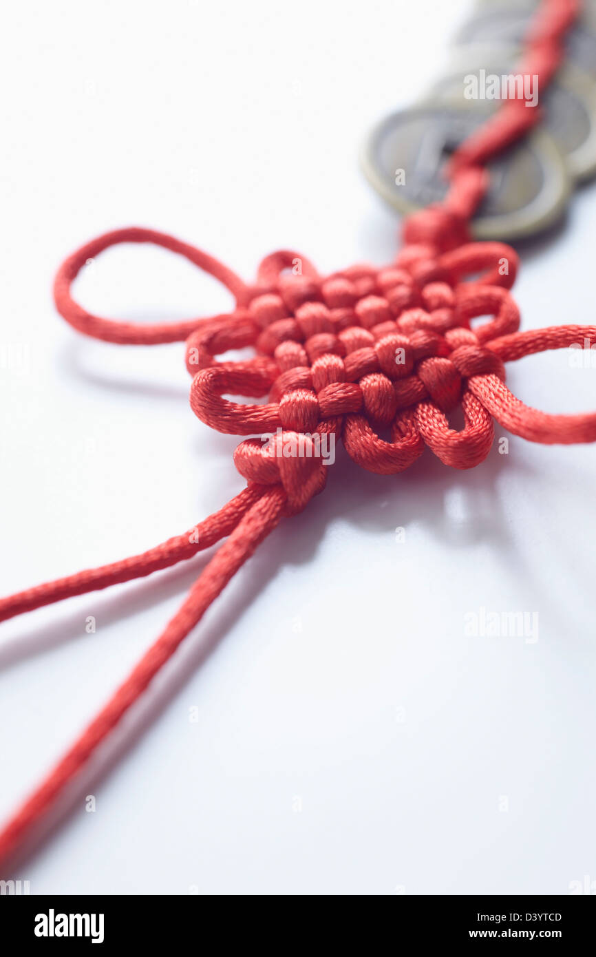 Chinese coins string hi-res stock photography and images - Alamy
