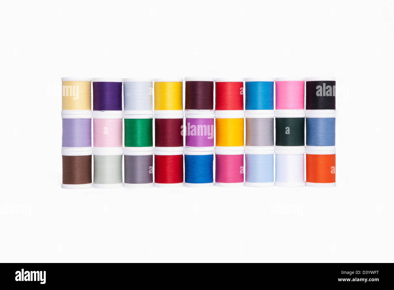 Sewing thread spools in Cut Out Stock Images & Pictures - Alamy