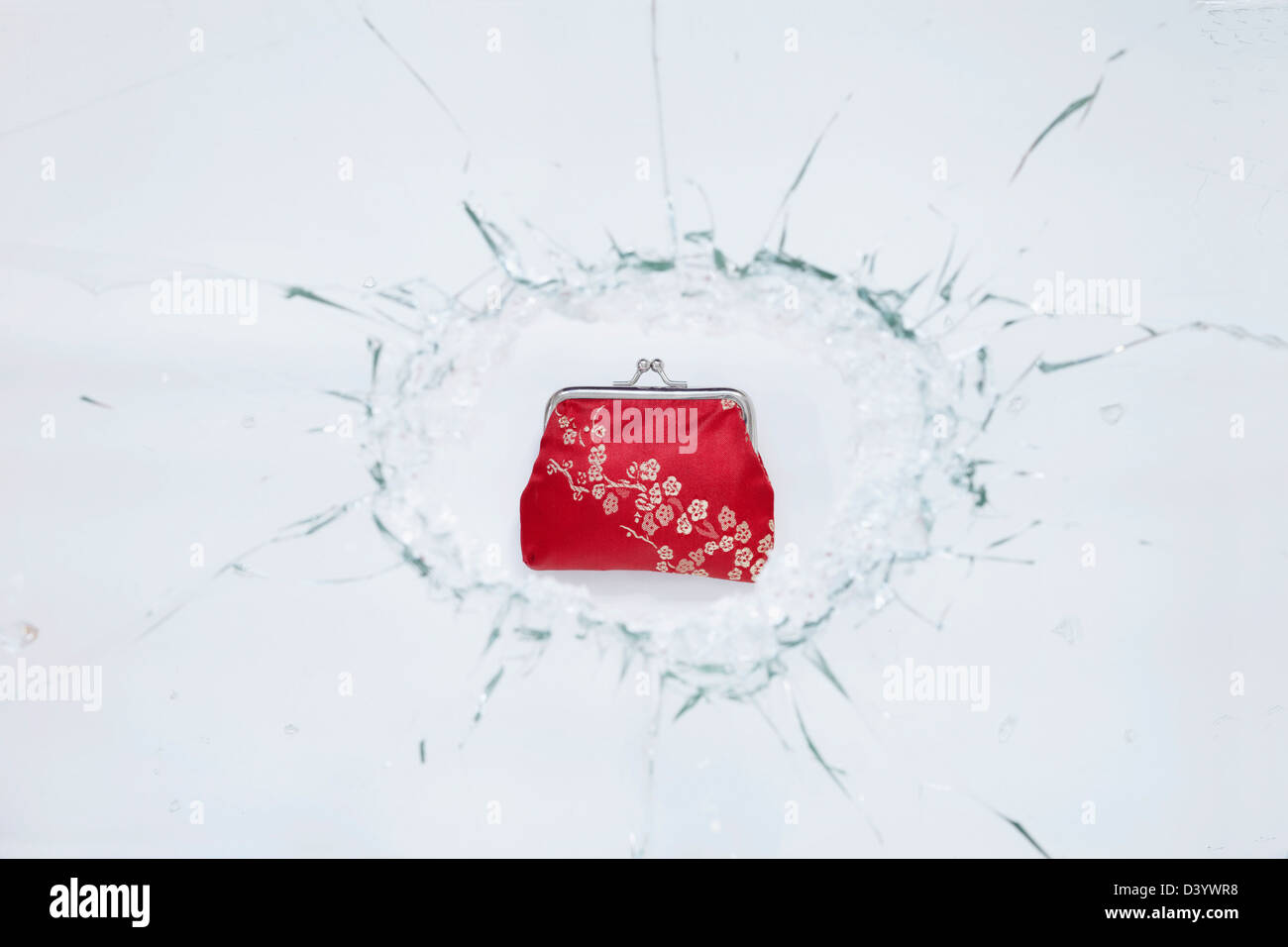 Change Purse and Broken Glass Stock Photo - Alamy