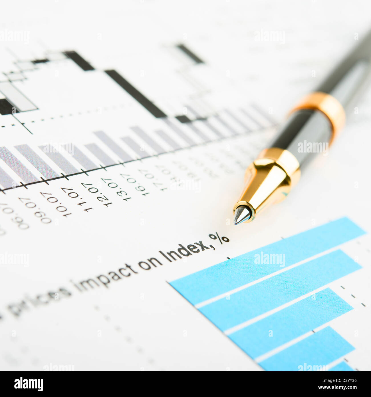 Pen showing a diagram on a report Stock Photo - Alamy