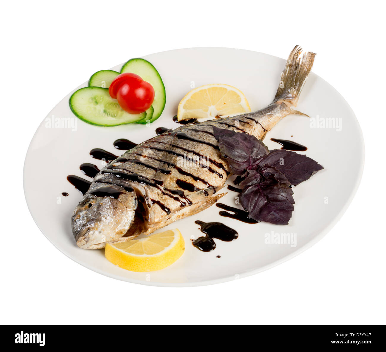 roast fish isolated on a white background Stock Photo - Alamy