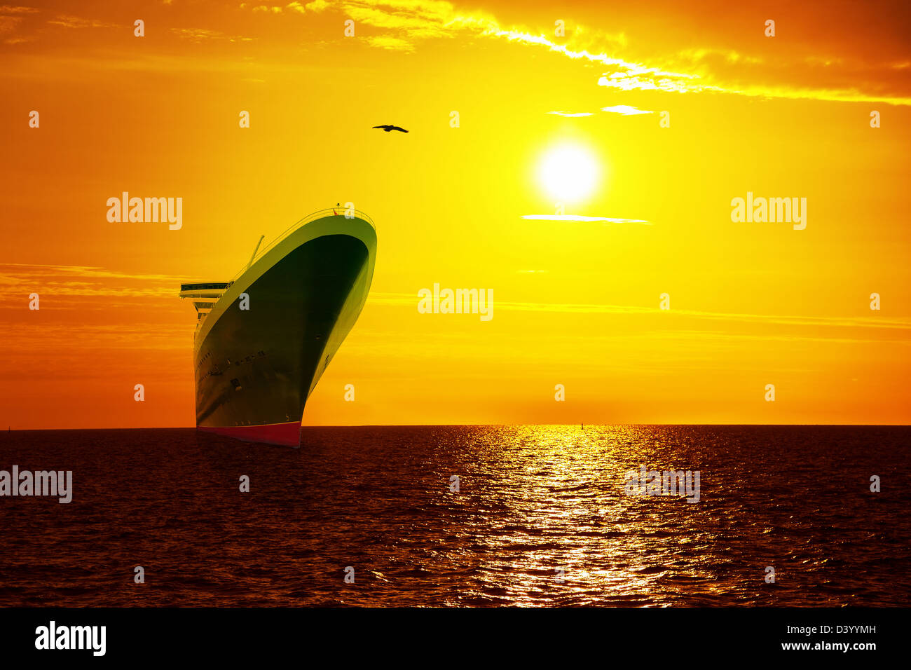 Big ship on sunrise in the sea Stock Photo - Alamy