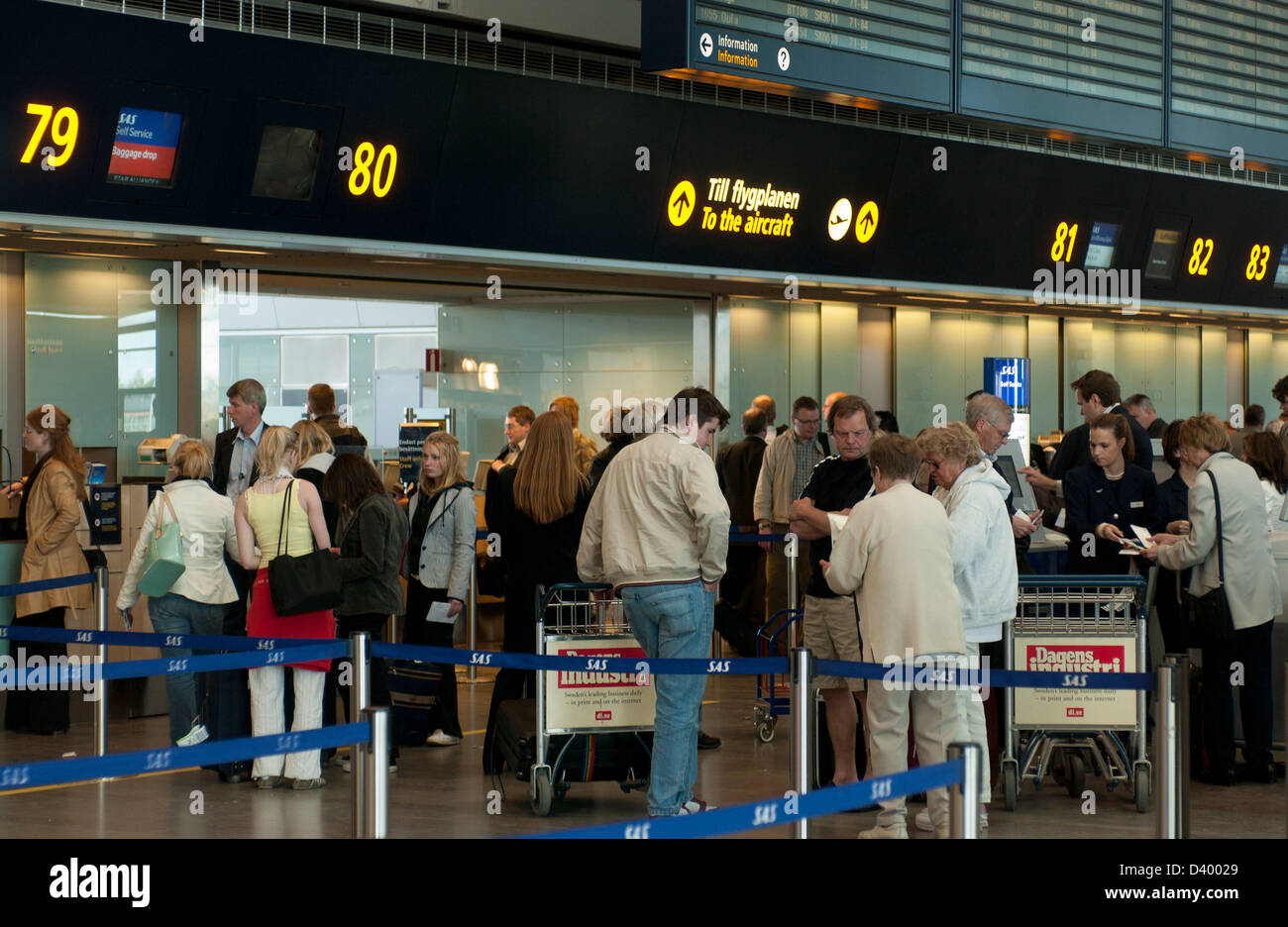 People checking in at the airport, Arlanda Airport, Stockholm, Sweden ...