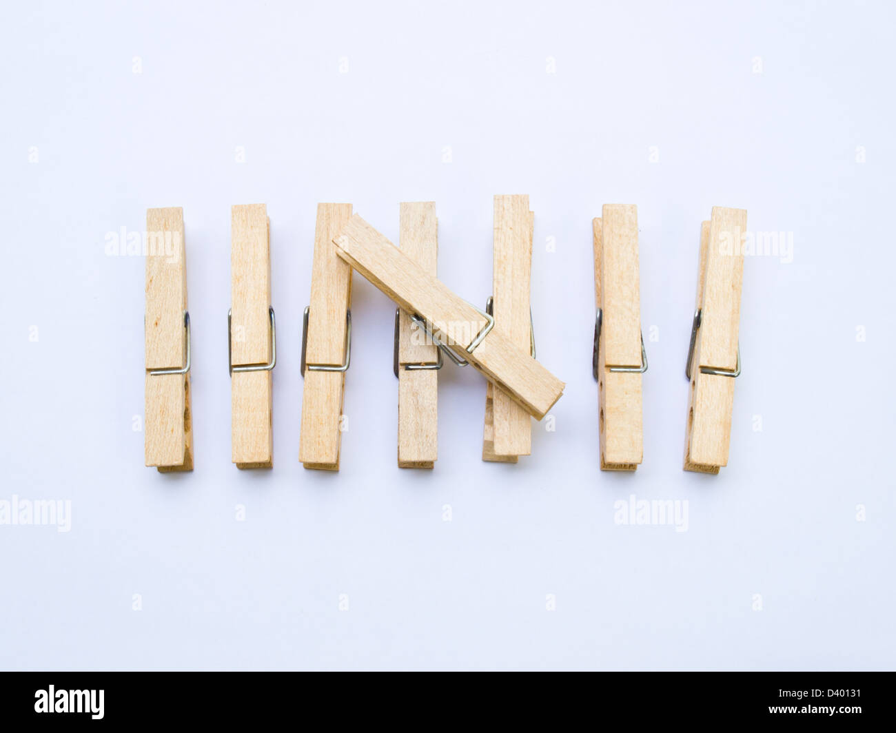 Wooden clothes clips isolated on white background Stock Photo - Alamy