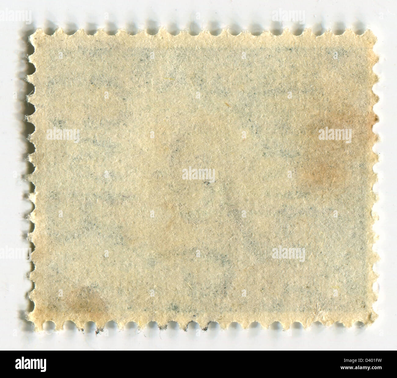 The reverse side of a postage stamp Stock Photo - Alamy