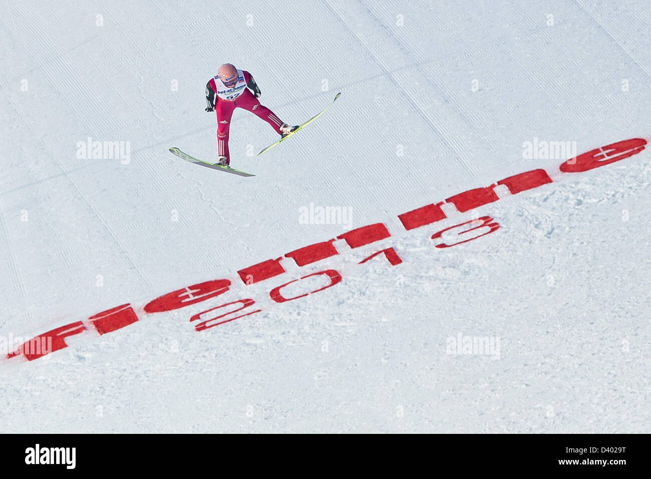 Michael Neumayer of Germany soars through the air during his ...