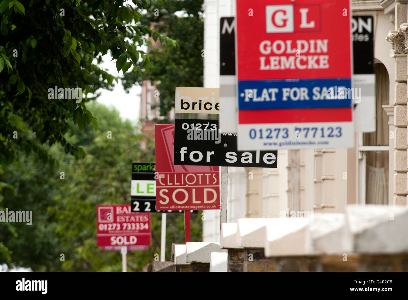 Sale boards in Brighton Stock Photo - Alamy