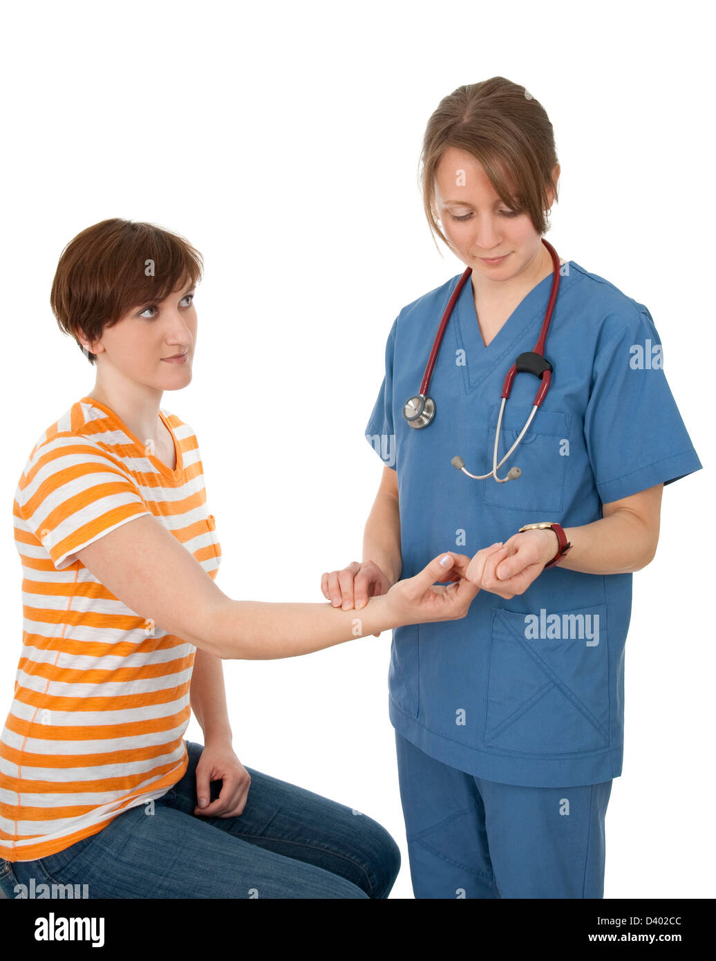 Competent young nurse measuring patient's pulse Stock Photo - Alamy