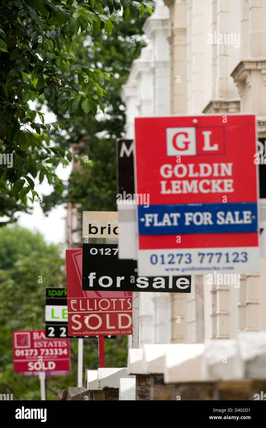 Sale boards in Brighton Stock Photo - Alamy