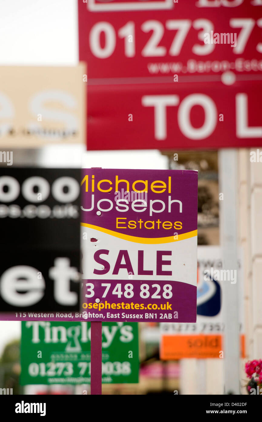 Sale boards in Brighton Stock Photo - Alamy