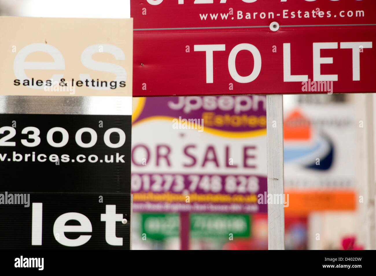 Sale boards in Brighton Stock Photo - Alamy