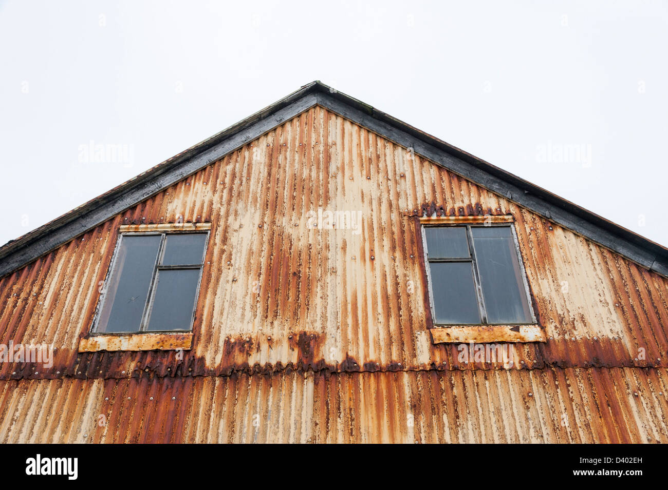 Old rusting corrugated iron building in the fishing town of Grindavik ...