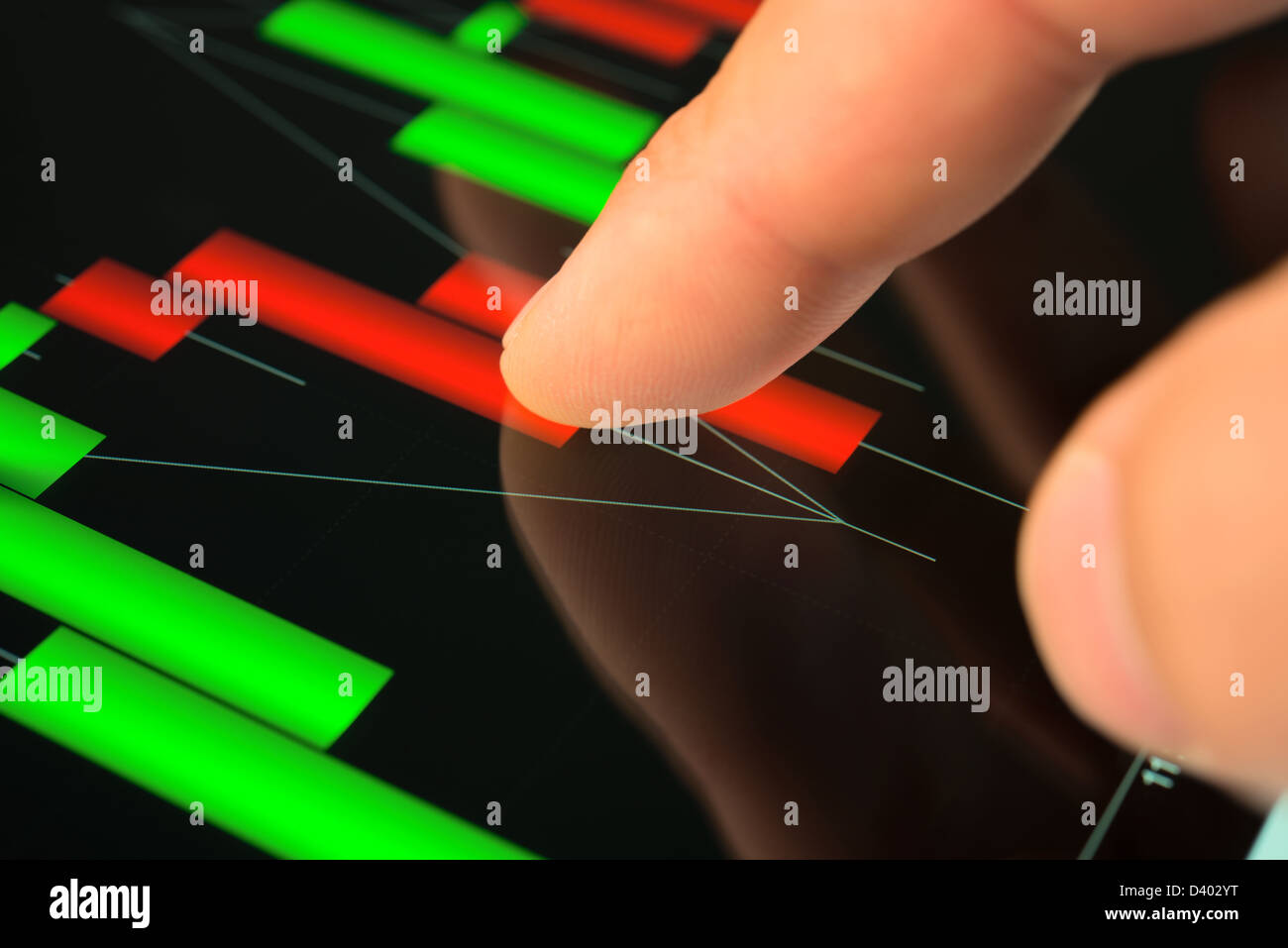 Businessman hand touching screen of tablet pc with market graph Stock ...
