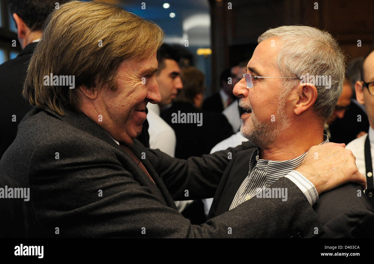 Former soccer player Guenter Netzer (L) and Gerd Mueller attend the ...