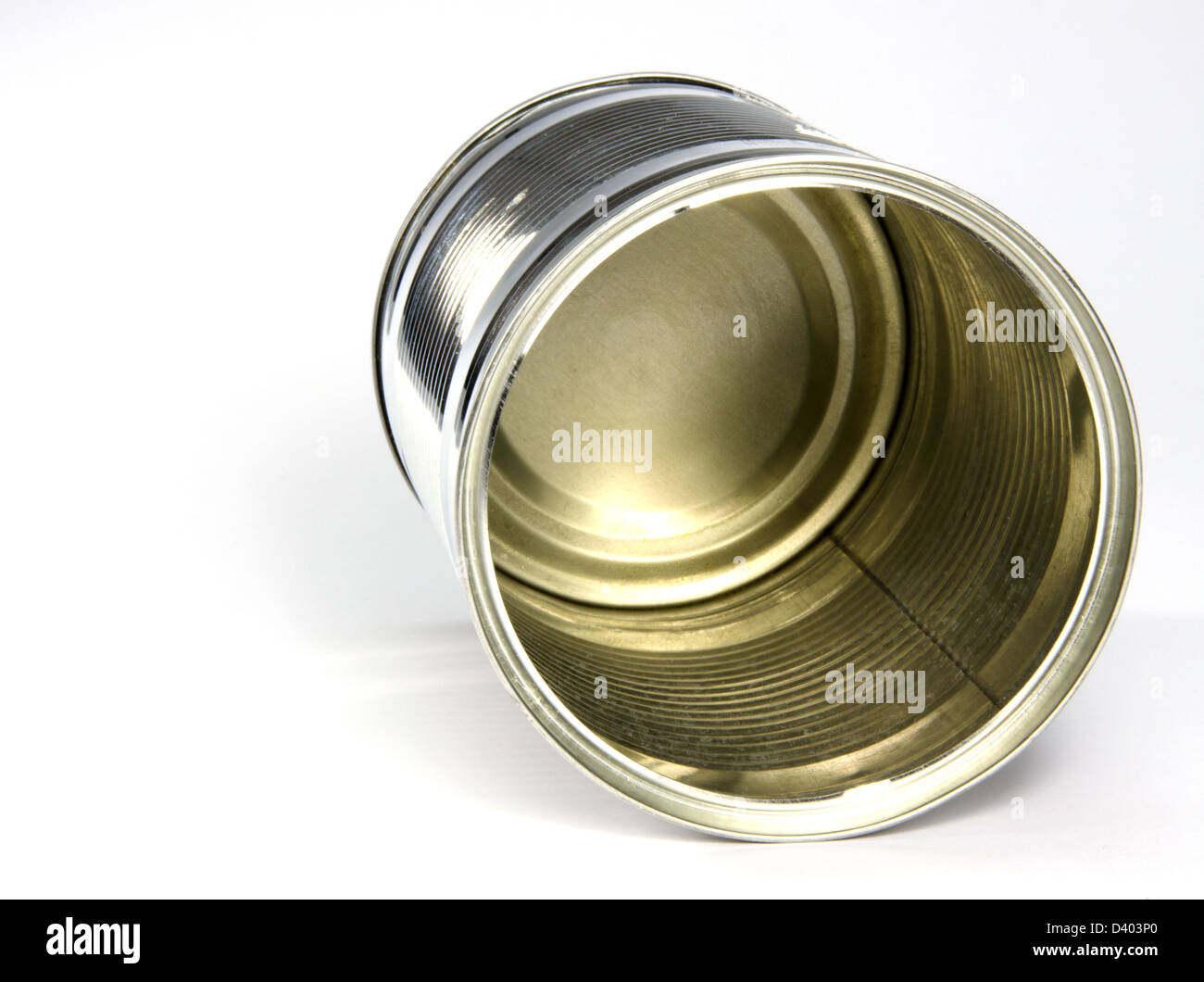 Inside of single tin can lying on side against white background Stock ...