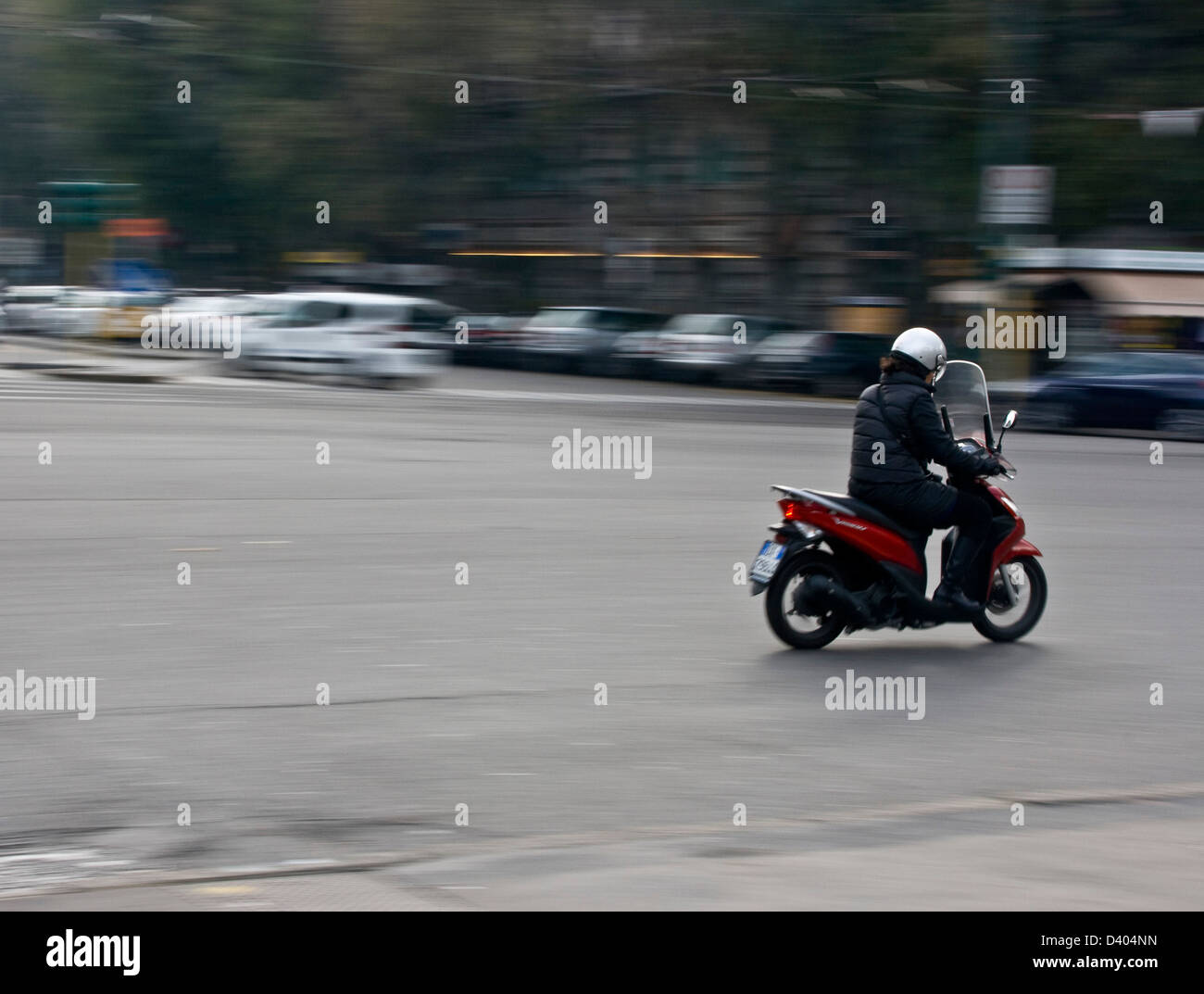 Motion blur of moped scooter speeding through Milan Milano Lombardy ...