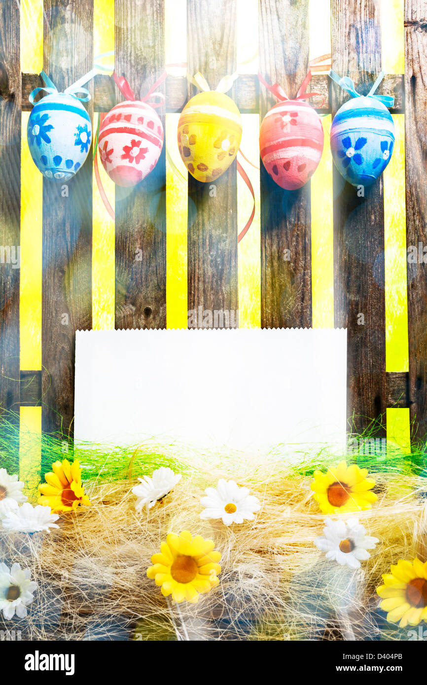Art easter background with fence, eggs, spring flowers, blank card for ...