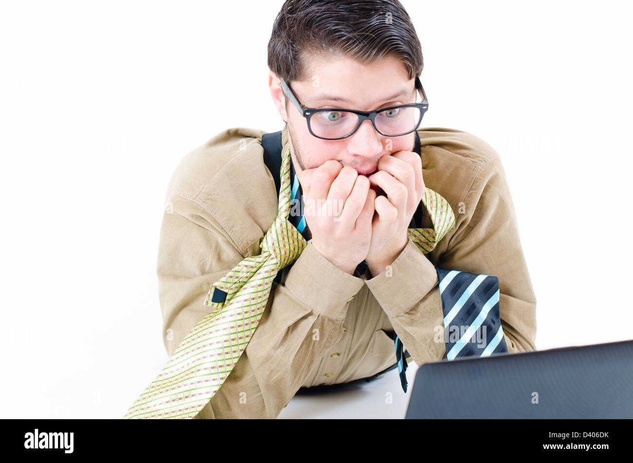 An shocked business man looking at his monitor Stock Photo - Alamy
