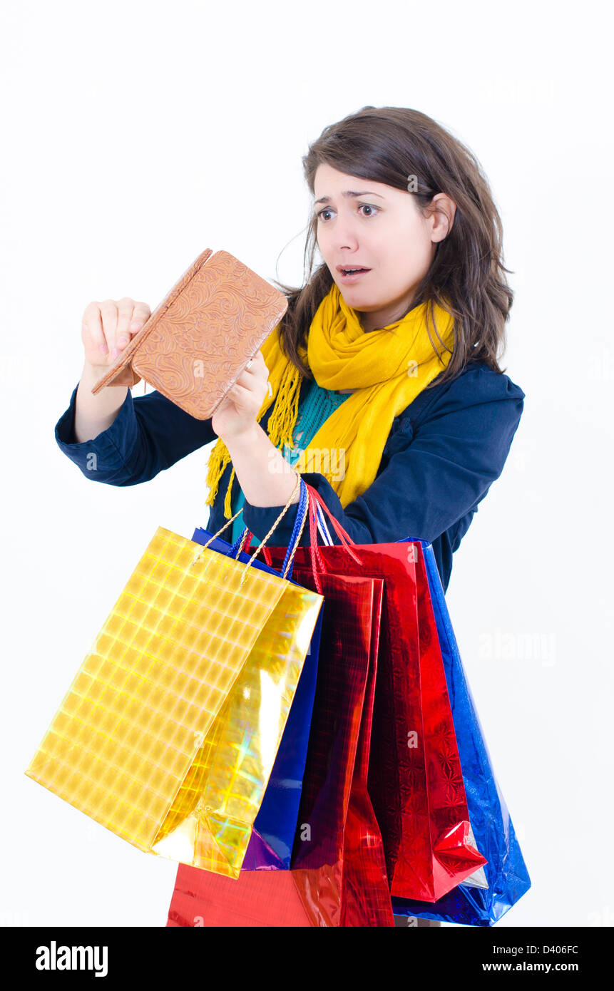 A shopaholic girl holding a empty wallet coming from shopping Stock ...