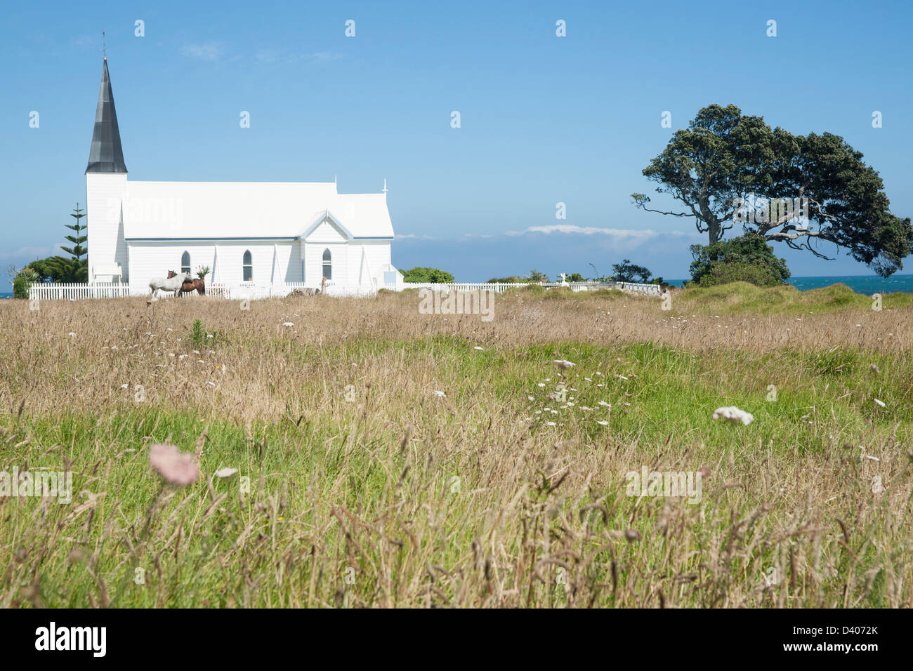 Traditional white church, in coastal setting Stock Photo - Alamy
