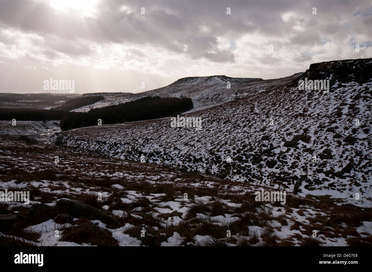 Higger Tor in the Peak District National Park with the last of the late ...