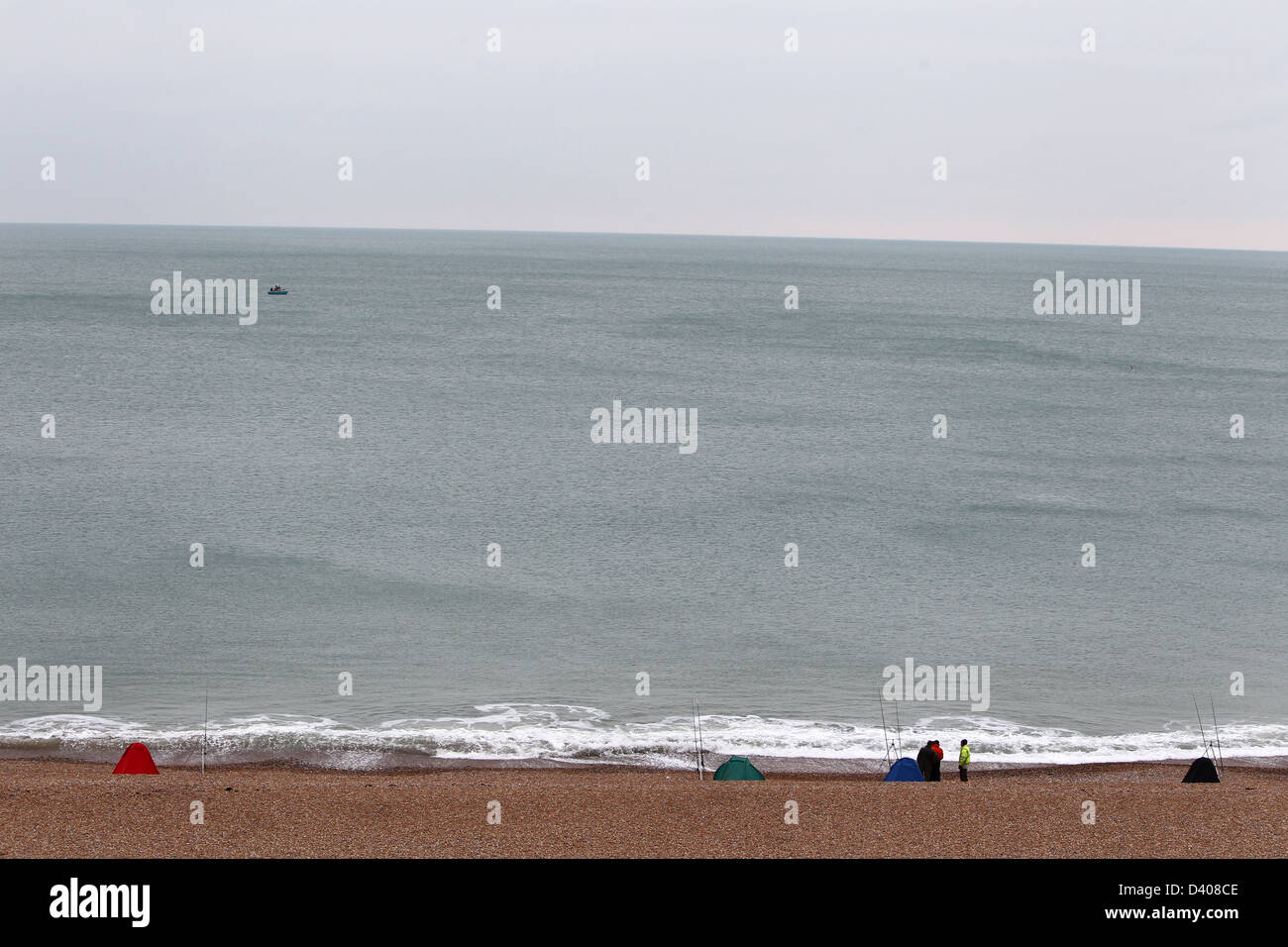 Fishermen pictured fishing on Brighton seafront, Brighton, East Sussex ...