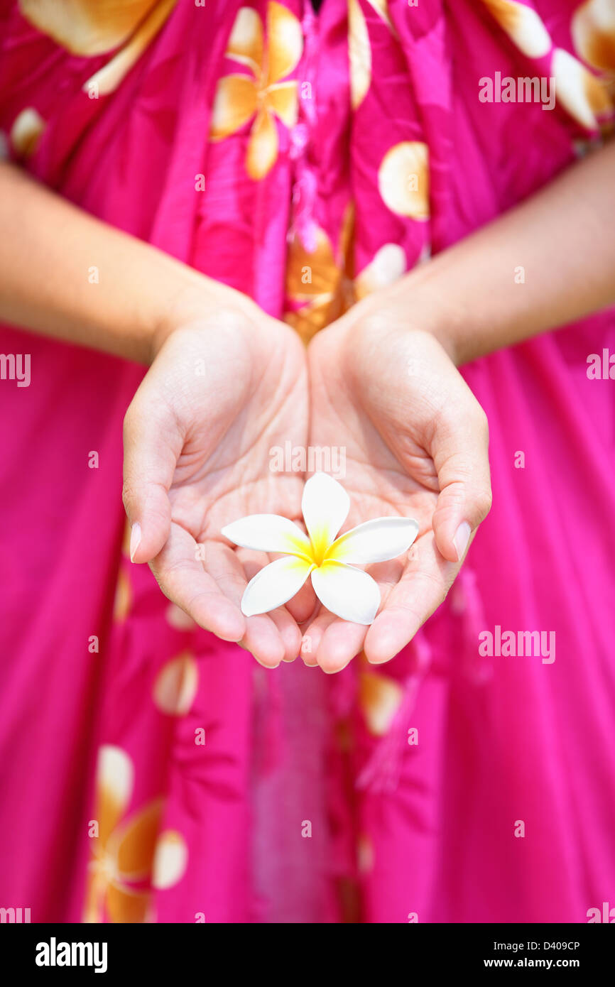 One hand offering flowers hi-res stock photography and images - Alamy