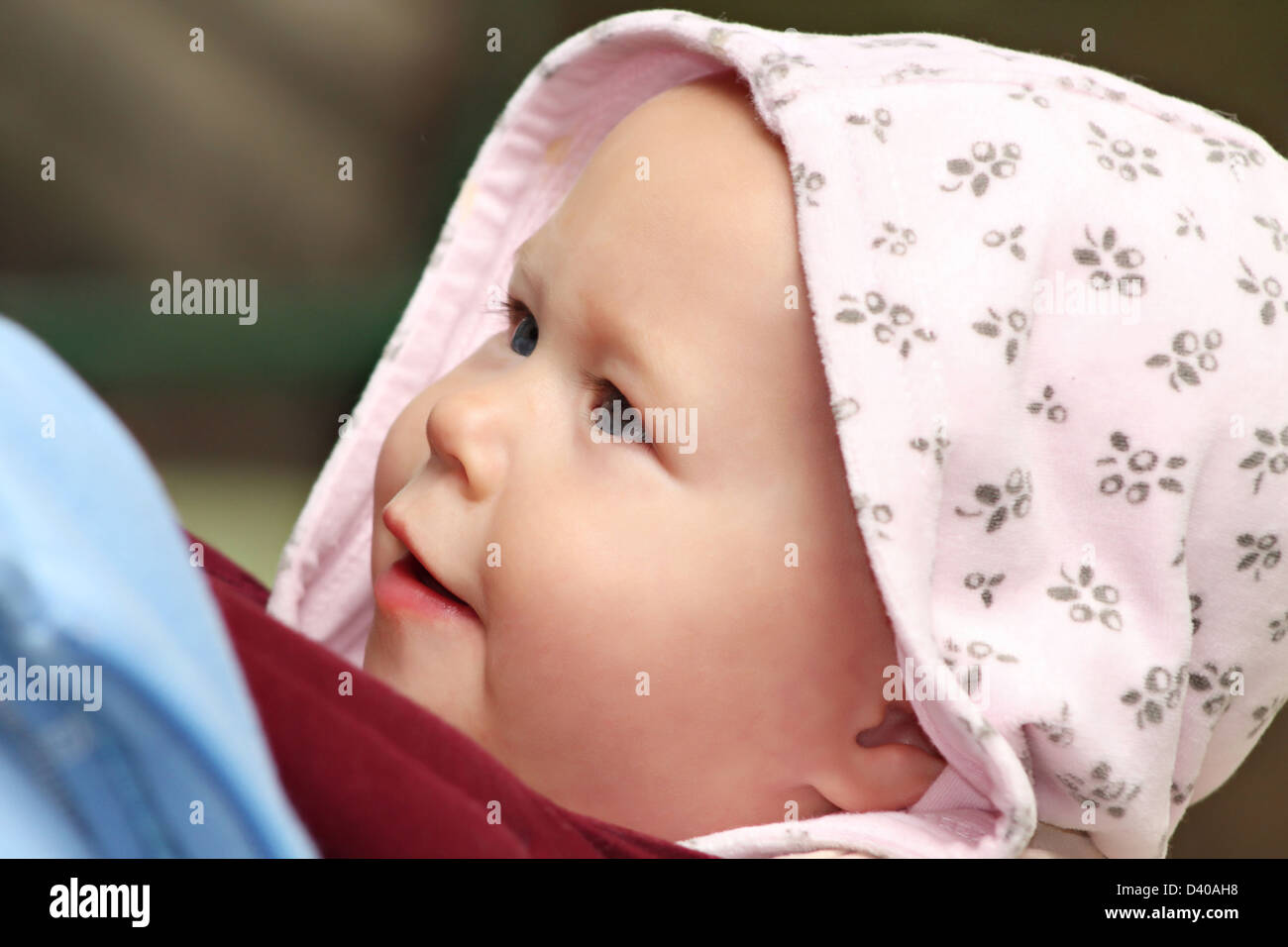 Baby portret in the sling Stock Photo - Alamy