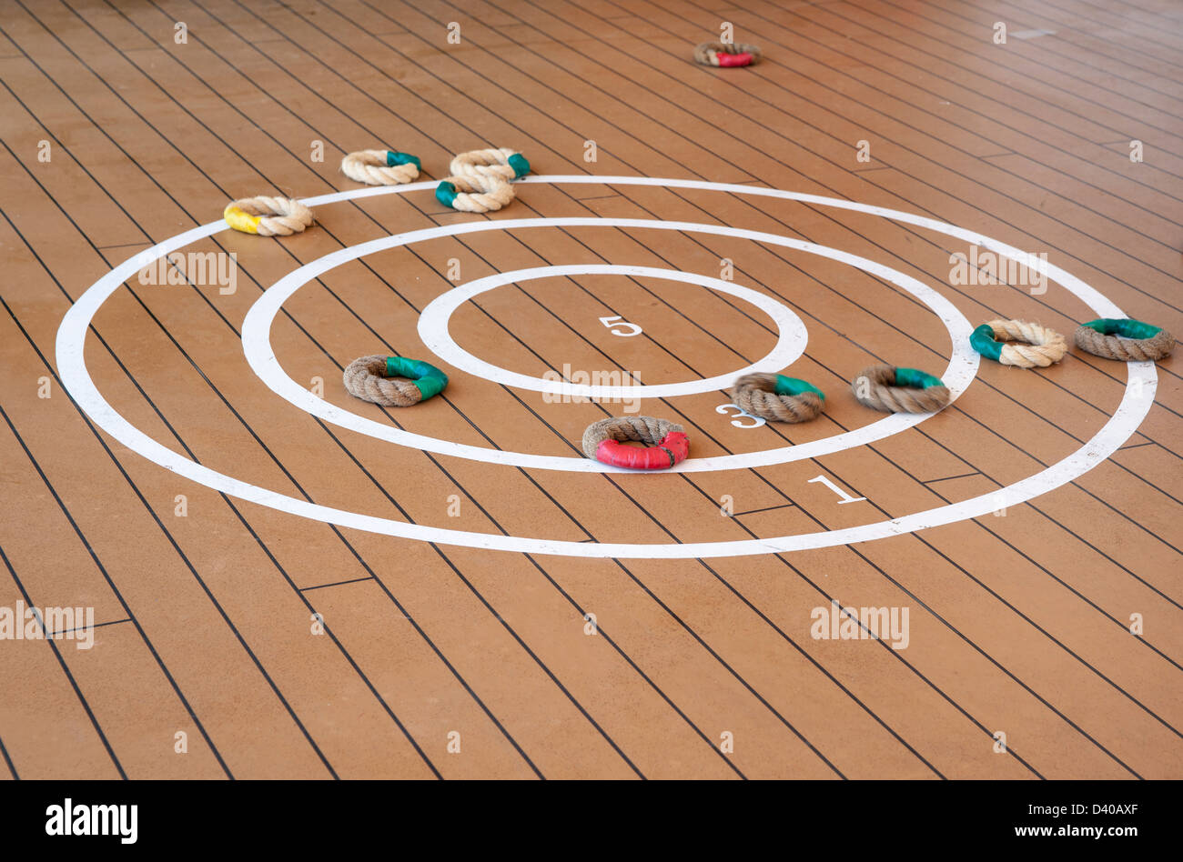 A game of quoits in progress, a traditional on-board game Stock Photo ...