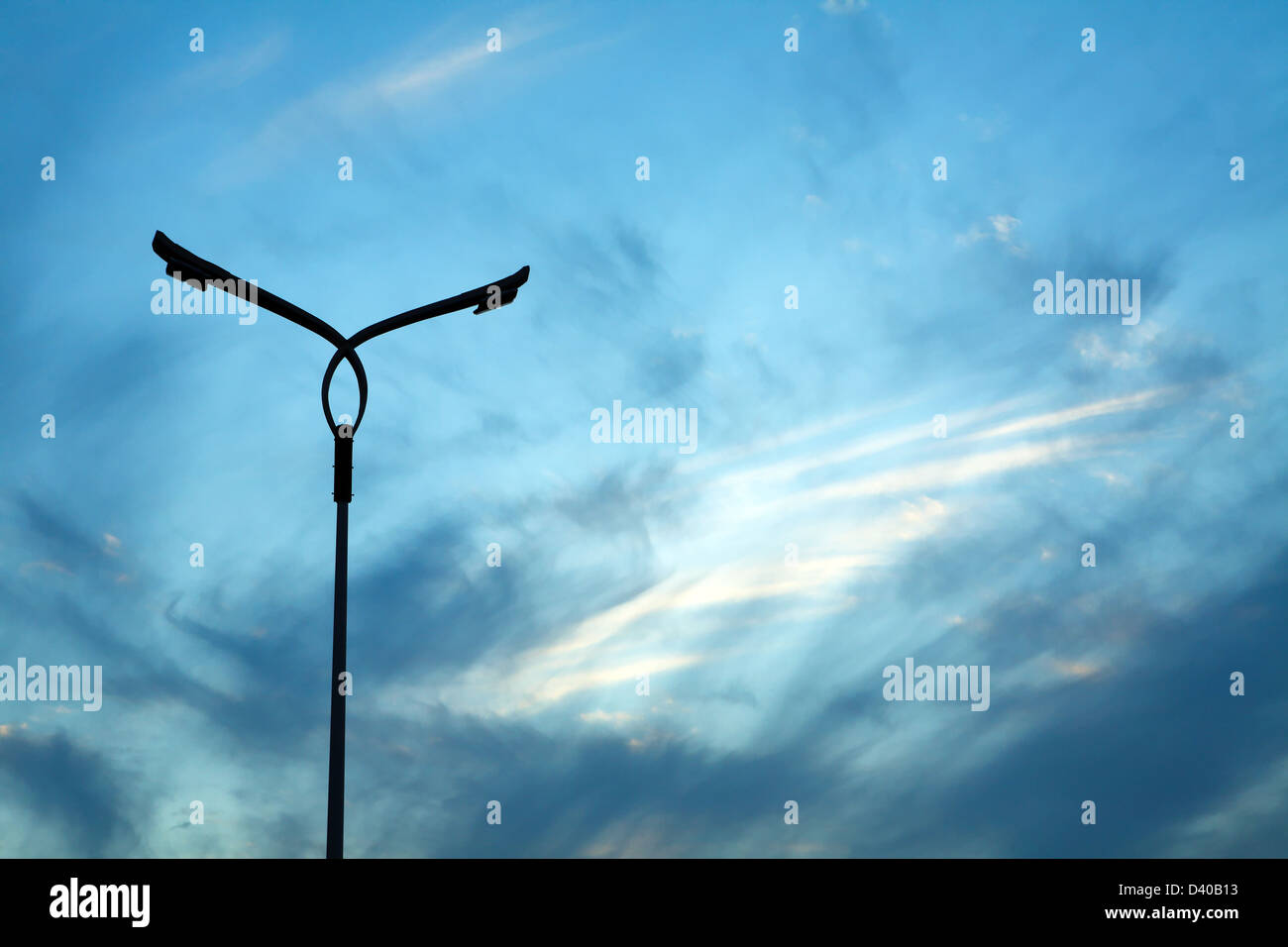 a simple, but interesting upward perspective capture of street lights ...