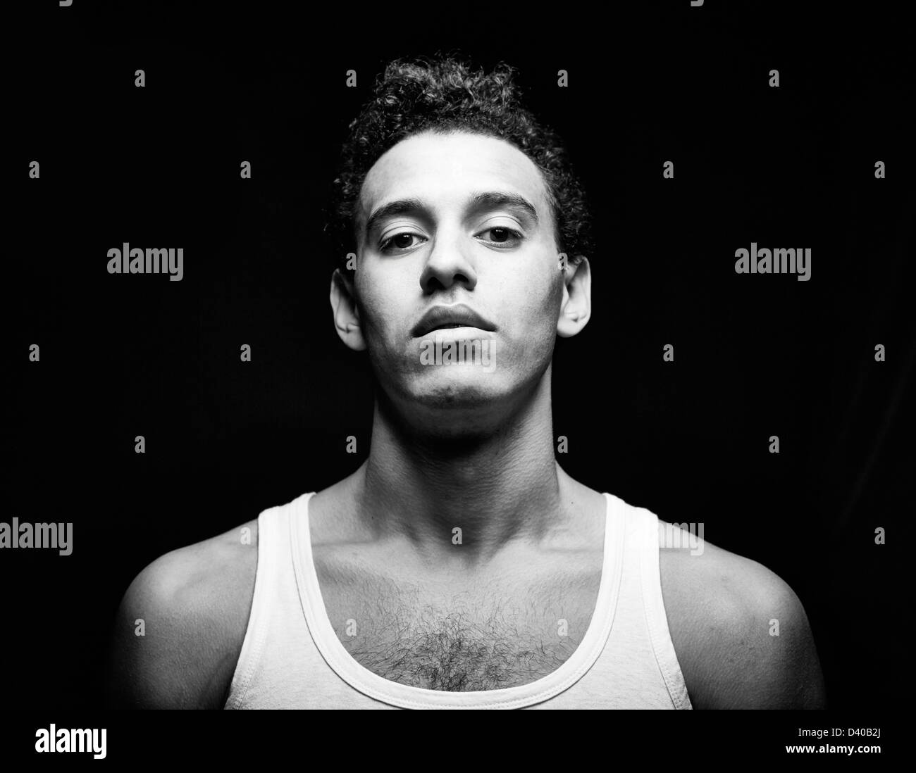 Man wearing white vest close up hi-res stock photography and images - Alamy