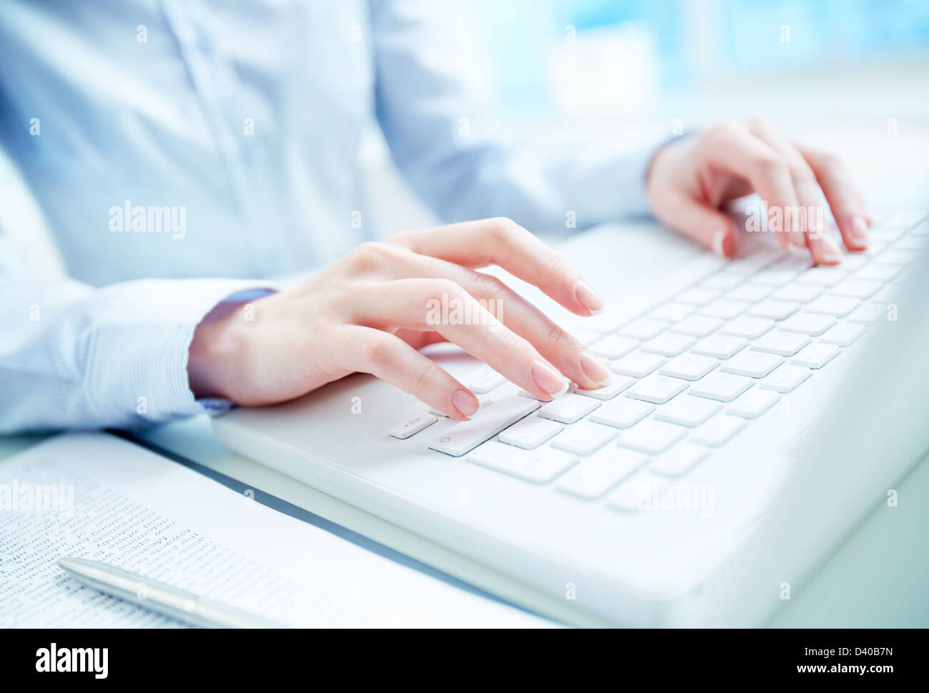 Worker typing hi-res stock photography and images - Alamy