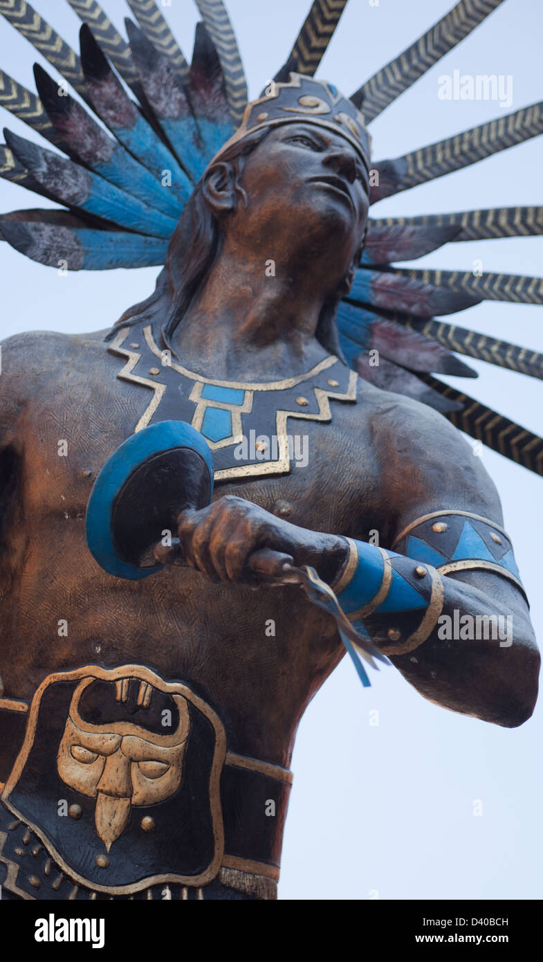 Plumed Indian dancer near Templo de San Francisco in the Spanish ...