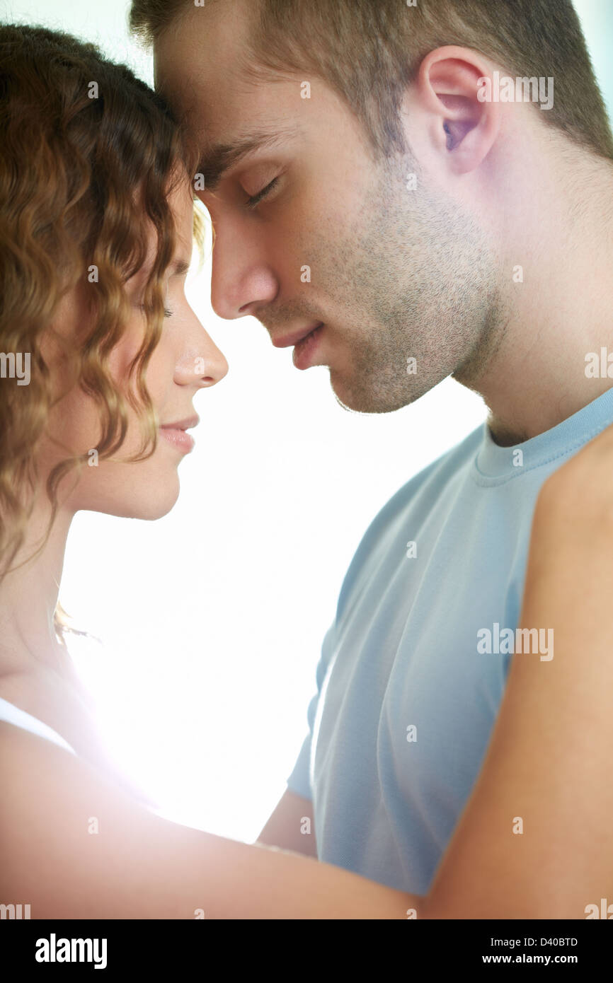 Young calm couple enjoying one another Stock Photo - Alamy