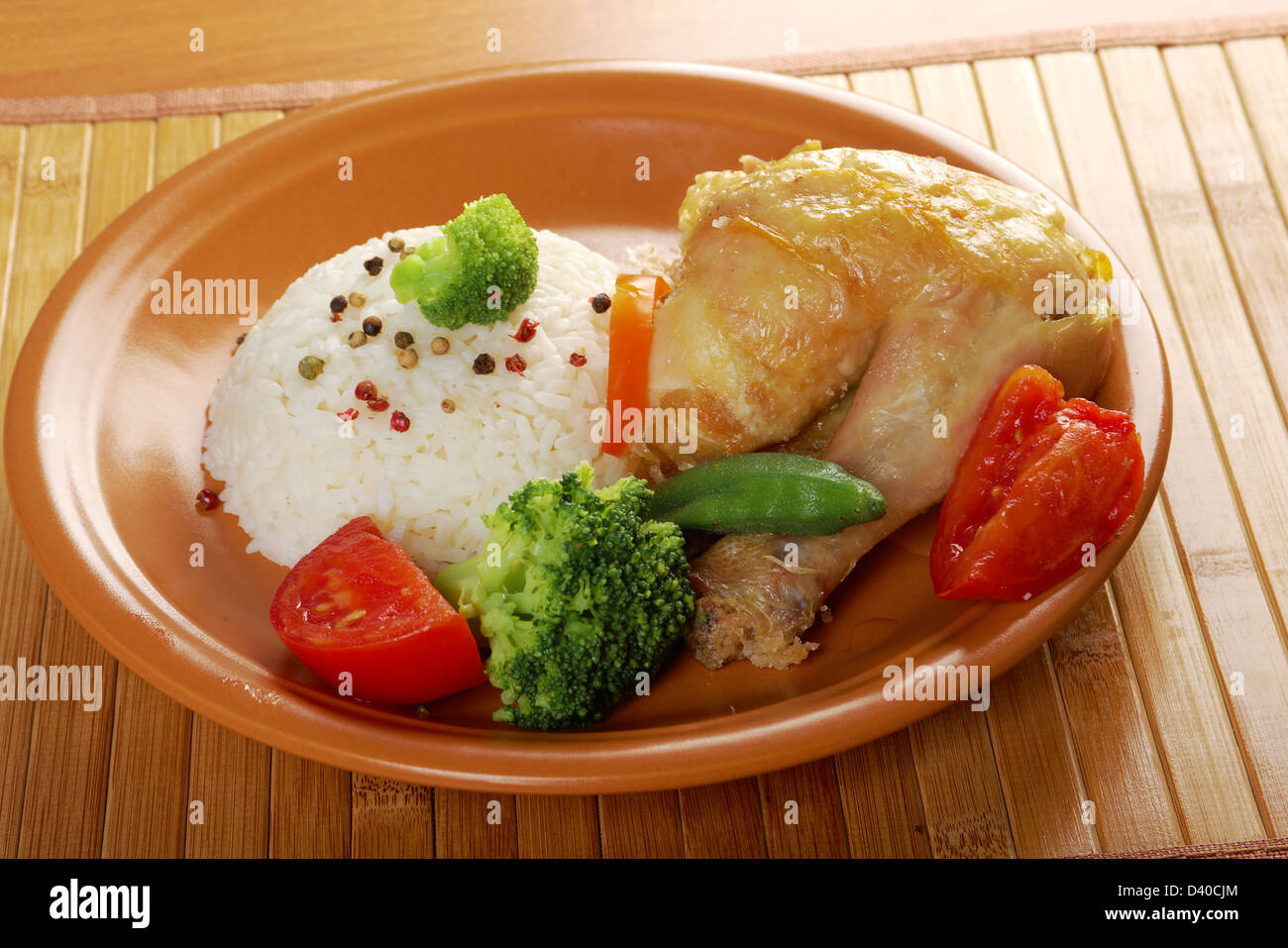 Rice and chicken and vegetables.сloseup Stock Photo - Alamy