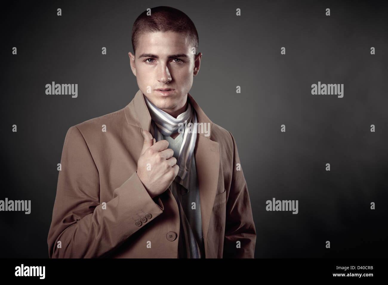 Young caucasian man in men's fashion photo taken in studio Stock Photo ...