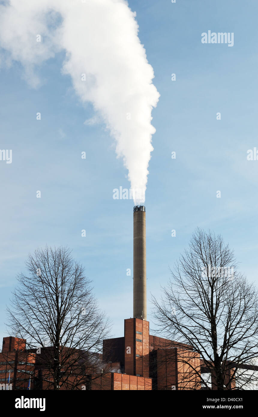 power station in winter, steam from stack against blue sky Stock Photo ...